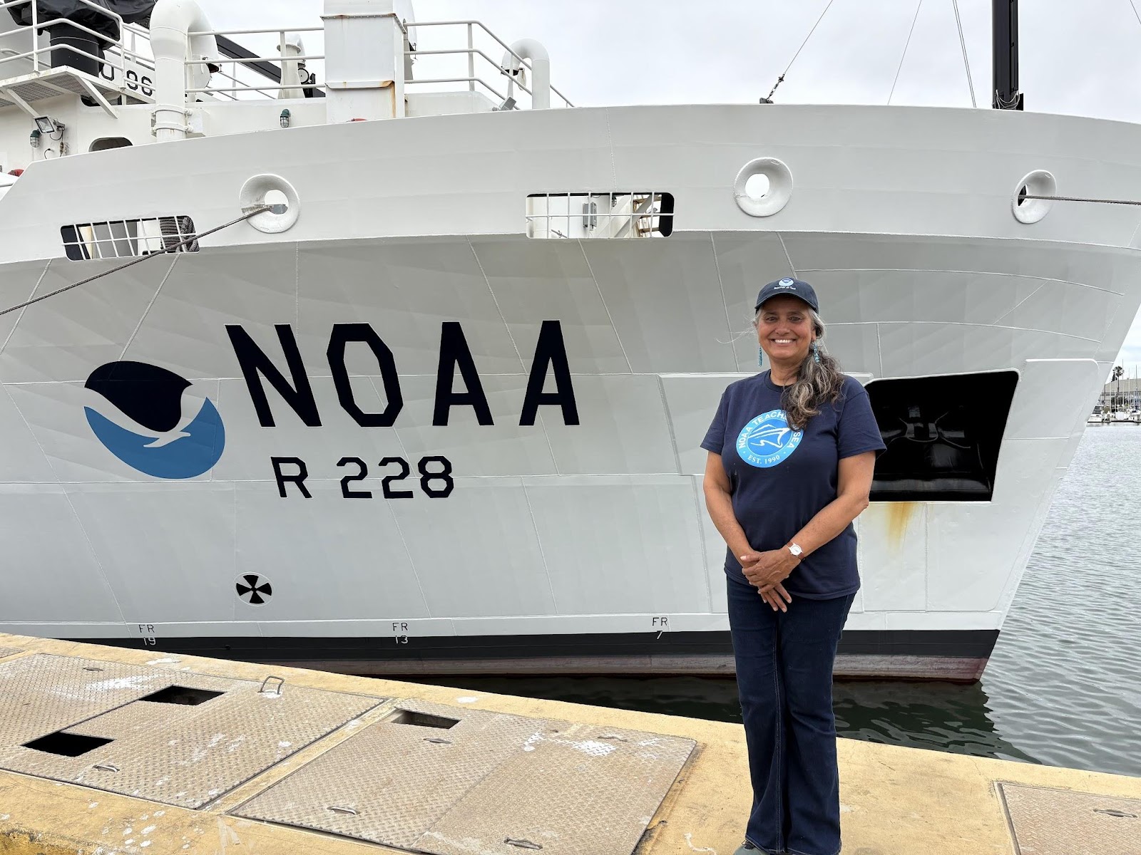 Omania_Jacqueline in front of Lasker bow – NOAA Teacher at Sea Blog