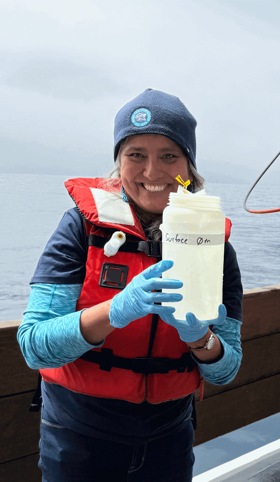 Omania_holding water sample – NOAA Teacher at Sea Blog